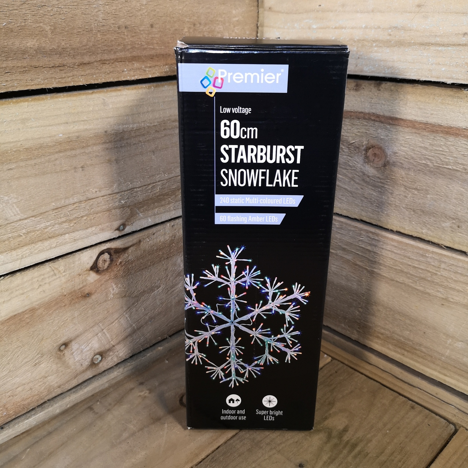 White Starburst Christmas Snowflake Multi Coloured twinkling lights.