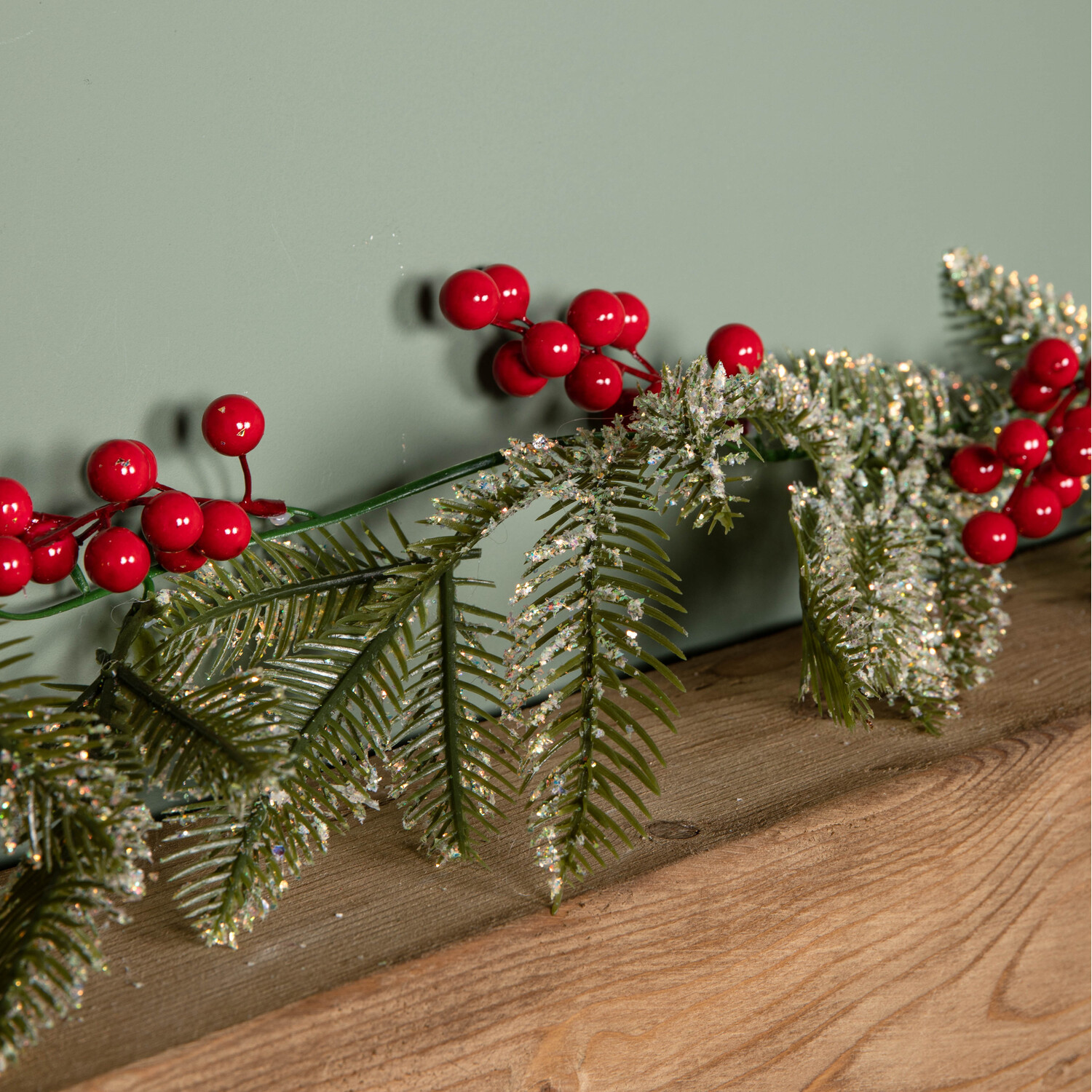 Plastic Christmas Garland with Red Berries and Seasonal Foliage