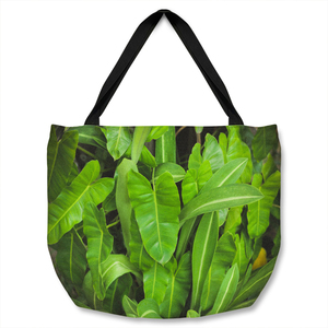 Abstract background of dark green leaves Designer Tote bag
